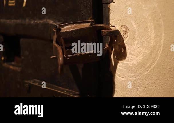Close-up of antique door handles and locks in a medieval castle ...