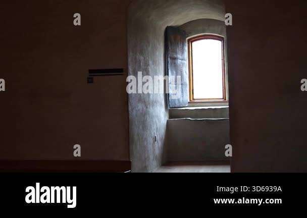 Interior of ancient castle rooms with stone walls, wooden furniture ...