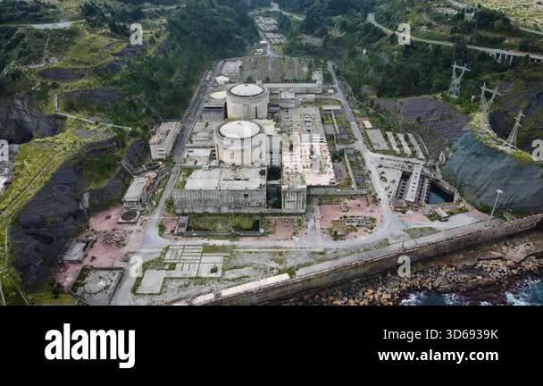 Aerial drone view of the abandoned Lemoiz nuclear power plant ruins on ...