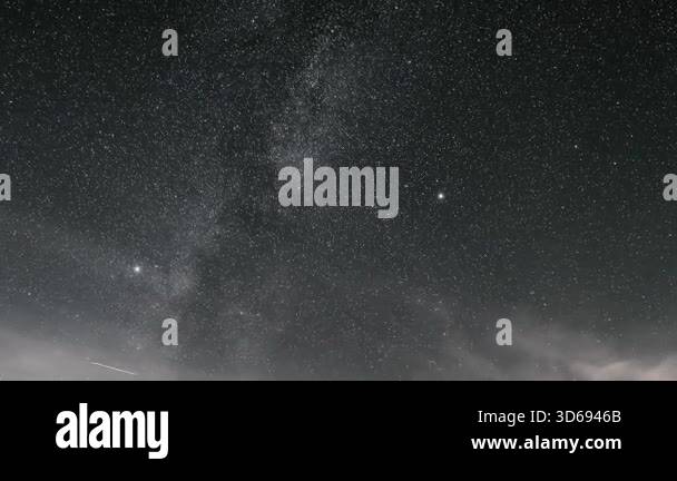 Astronomy time lapse showcasing Milky Way galaxy stars and fine cirrus ...