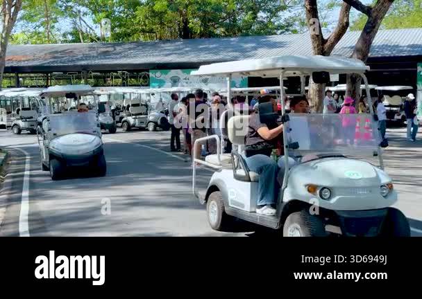 Tourists boarding carts at Khao Kheow Zoo Stock Video Footage - Alamy