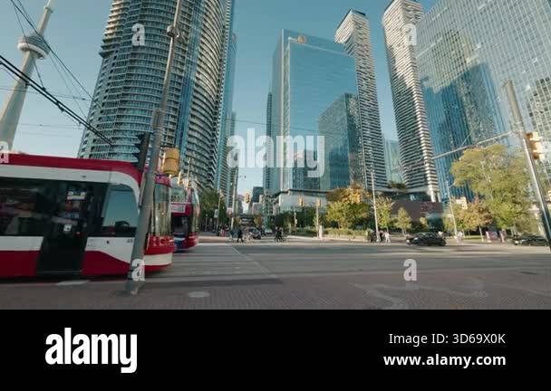 Toronto, Canada, 28 October 2025: Red Toronto streetcar at a busy ...
