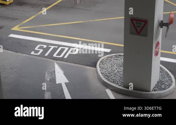 Clear traffic signs help guide vehicles and pedestrians in a busy area ...