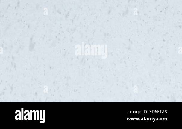 Close-up of snowflakes falling against a white winter sky. Soft ...