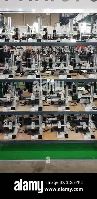 Kyiv, Ukraine, May 25, 2025: Many 3D printers printing object. 3D ...