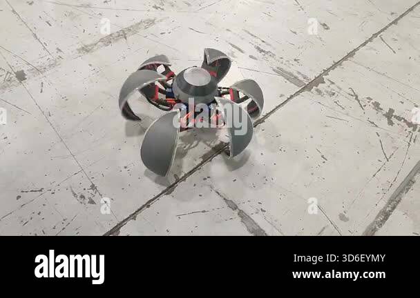Moving small robot on remote control. Radio controlled robot. Small ...