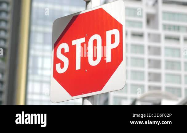 Bright red stop sign stands Stock Videos & Footage - HD and 4K Video ...