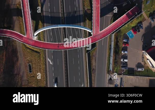 Pedestrian Bicycle Bridge Over city highway Suburbs. Aerial photo ...