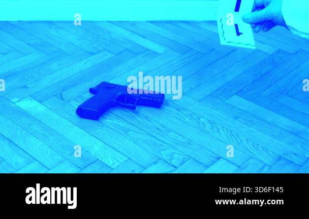 CSI technician working indoor on evidences collecting and ...