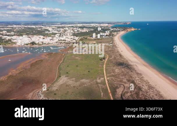 Alvor aerial view drone aerial coastline stretch with golden beach and ...
