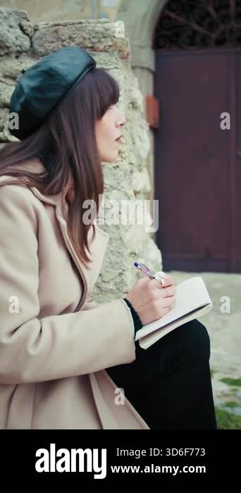 Woman Poet Writing Poems Outdoor In Her Town Stock Video Footage - Alamy