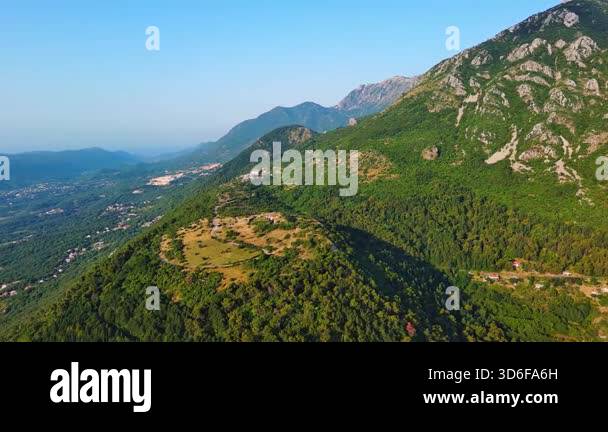 High green rocky peaks of the Montenegrin mountains with fresh ...