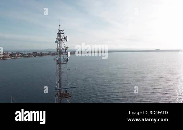 A working modern marine radar station located in a sea small concrete ...