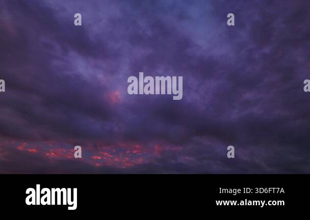 Timelapse video of a stunning sunrise with glowing sky and colorful ...