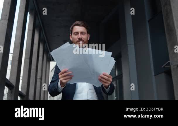 Successful happy Caucasian mature business man throwing papers walking ...