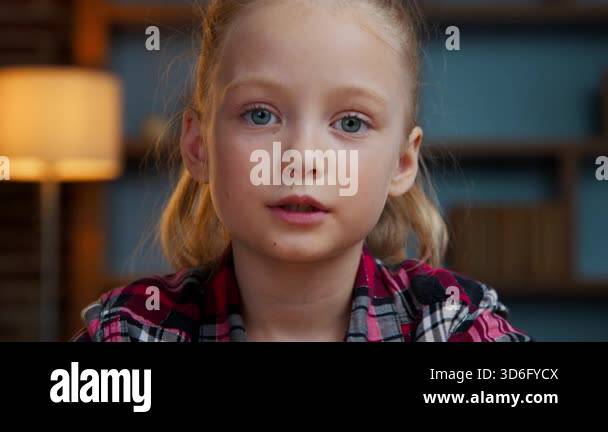 Portrait web cam view Caucasian cute kid girl child talking looking to ...
