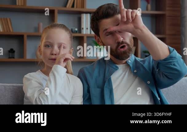 Happy Caucasian family at home father with daughter playing fooling ...