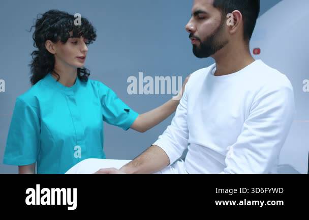 Patient visiting MRI procedure in clinic, start of computerized axial ...