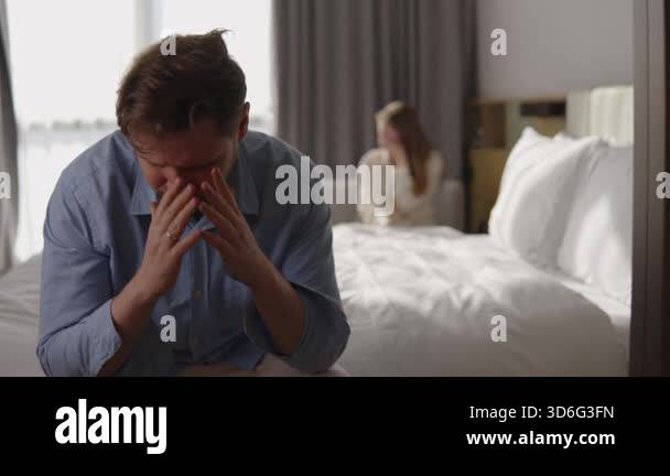 Stressed man arguing with wife about financial problems and unpaid ...