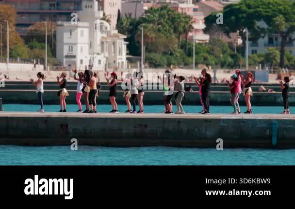 Cannes, France - October 7, 2025: A group of people practicing dance or ...