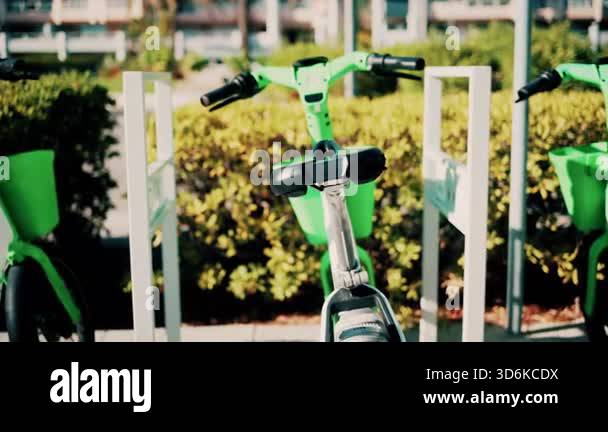 Close up of a green electric bicycle with modern design, parked ...
