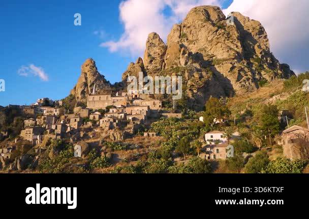 Ancient village of Pentedattilo Calabria Italy built on rocky mountain ...