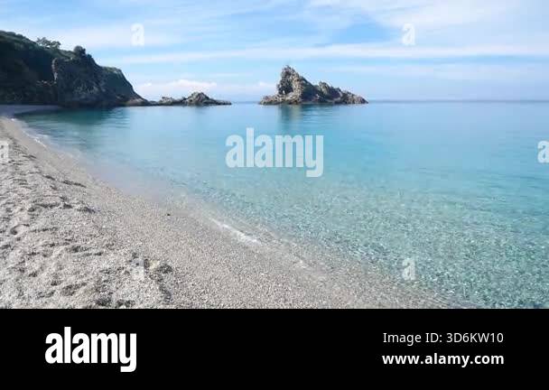Rocky coastline of Palmi Calabria Italy with turquoise transparent sea ...