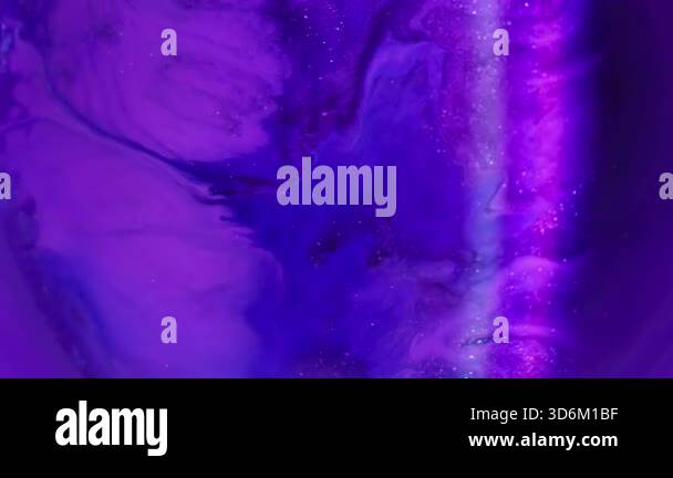 Vibrant fluorescent spatter. Flowing texture. Defocused purple blue ...