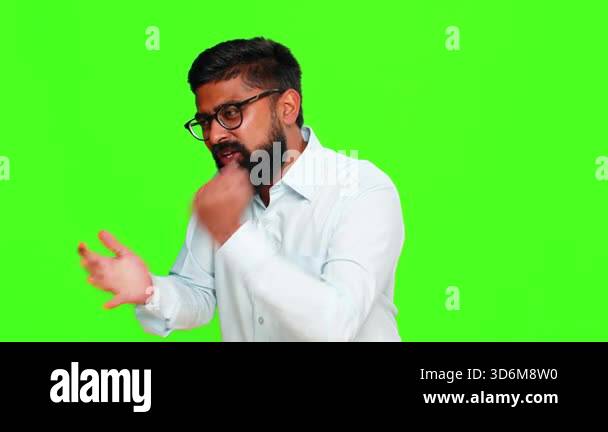 Indian man hits fist into open palm with decisive expression ...