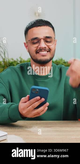 Happy man use mobile smartphone typing browsing say Wow yes ...