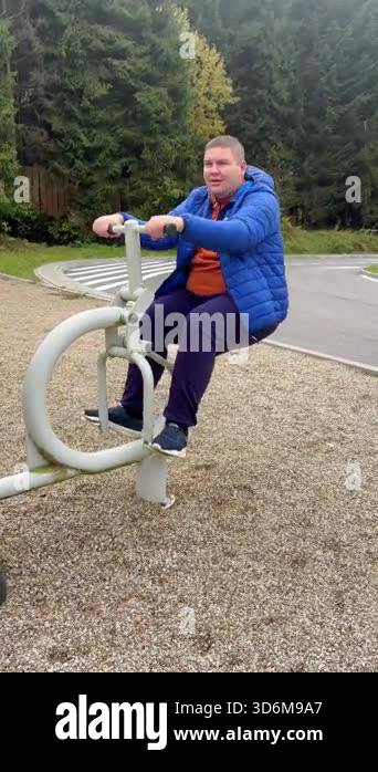 Young overweight man exercising outdoor Stock Video Footage - Alamy