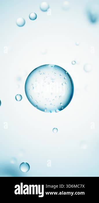 Macro of transparent drop of blue liquid with bubbles inside on blue ...