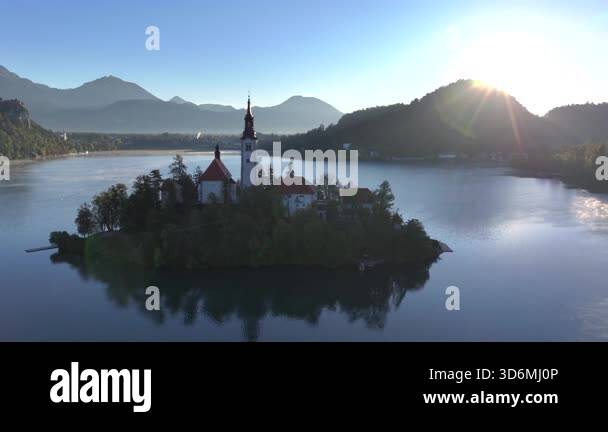 Aerial view of Lake Bled at sunrise in autumn, Slovenia. Pilgrimage ...