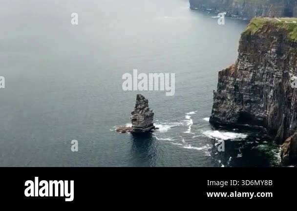 Rugged Sea Cliffs and Sea stack on Ocean Coast Stock Video Footage - Alamy