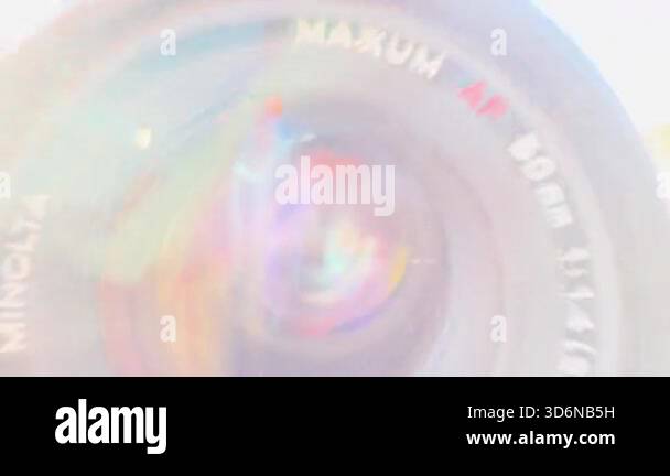 Izmir, Turkey - Nov 3 2025: Woman in twenties looking through camera ...