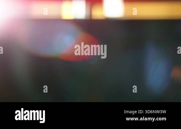 Slow motion of real lens flare through glass effects for overlay or ...