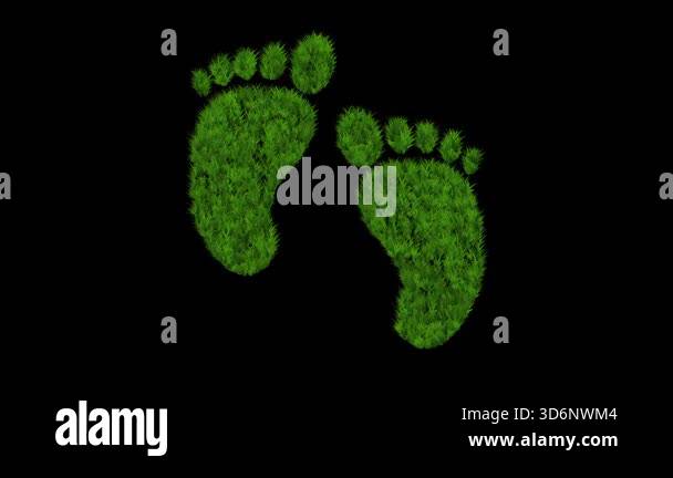 Footprints with growing green grass effect on plain black background ...