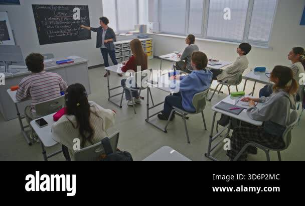 During Lecture on Game Development, Teacher Explains Topic and Asks ...