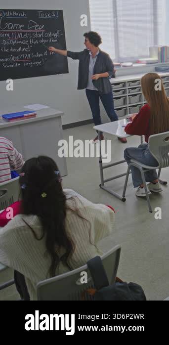 During Lecture on Game Development, Teacher Explains Topic and Asks ...