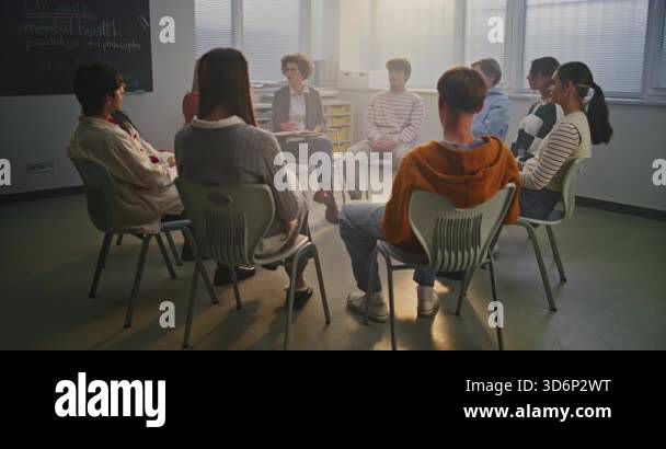 Female Teacher Leads Open Discussion With Students About Mental Health ...