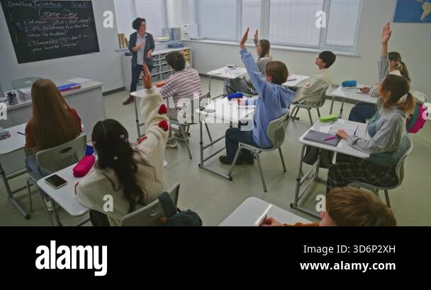 Female Teacher in Programming Class Calls Student to Blackboard to ...