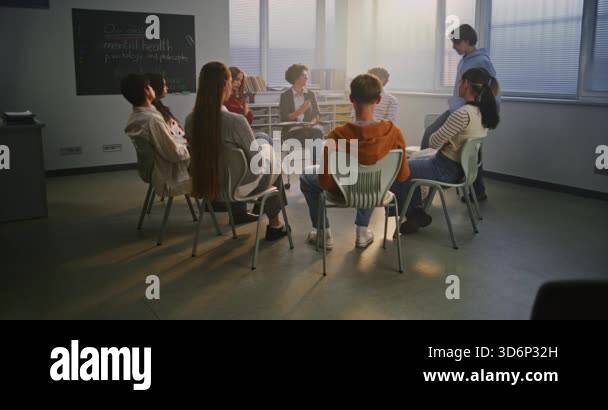 Teen Students Sit in Circle With Caring Teacher Discussing Psychology ...