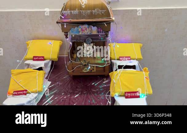 sarva dharma prathana mandir with sacred texts and holy hindu god idols ...