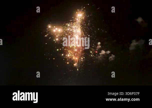 Aerial firework burst with golden sparks in nighttime sky Stock Video ...