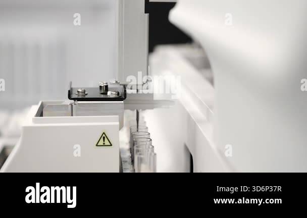 Automatic laboratory analyzer performs precise movements and sample ...