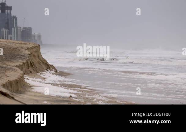 A stormy scene captures coastal erosion at Broadbeach, with powerful ...