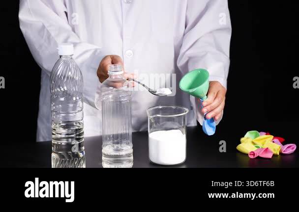 Demonstrating chemical reaction with balloons and bottles Stock Video ...