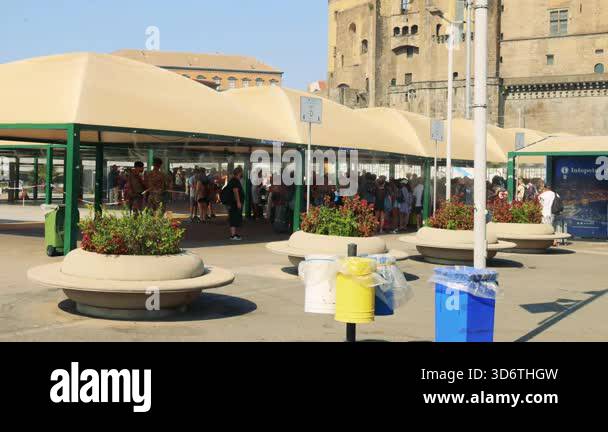 Crowd gathers at Sorrento bus stop in Naples Stock Video Footage - Alamy