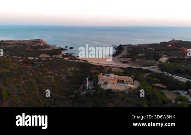 aerial coastal villa overlooking secluded beach and mediterranean ...