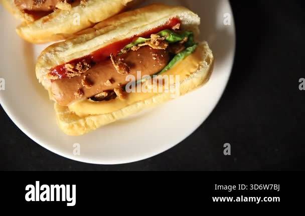Hot dog fried onions, sausage, bun, sauce fast food tasty snack fresh ...